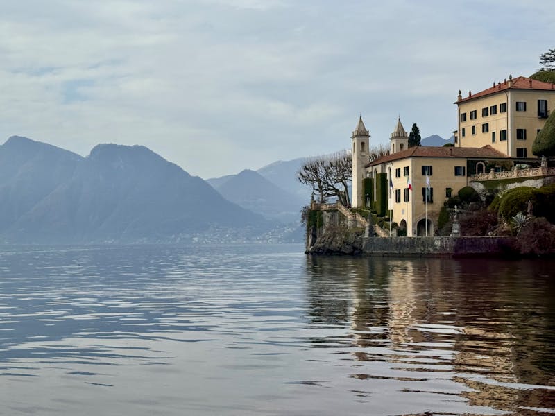 Villa Monastero on Lake Como with surrounding mountains and tranquil waters