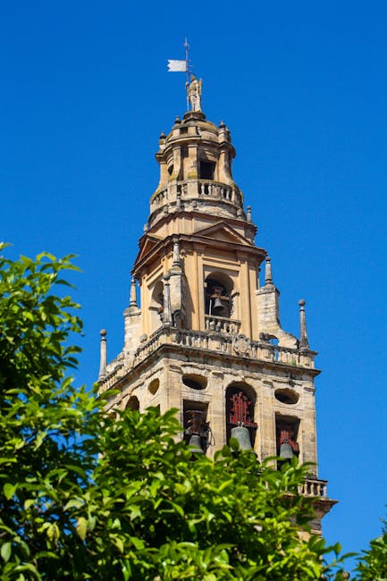 Cordoba Cathedral bell tower against blue sky