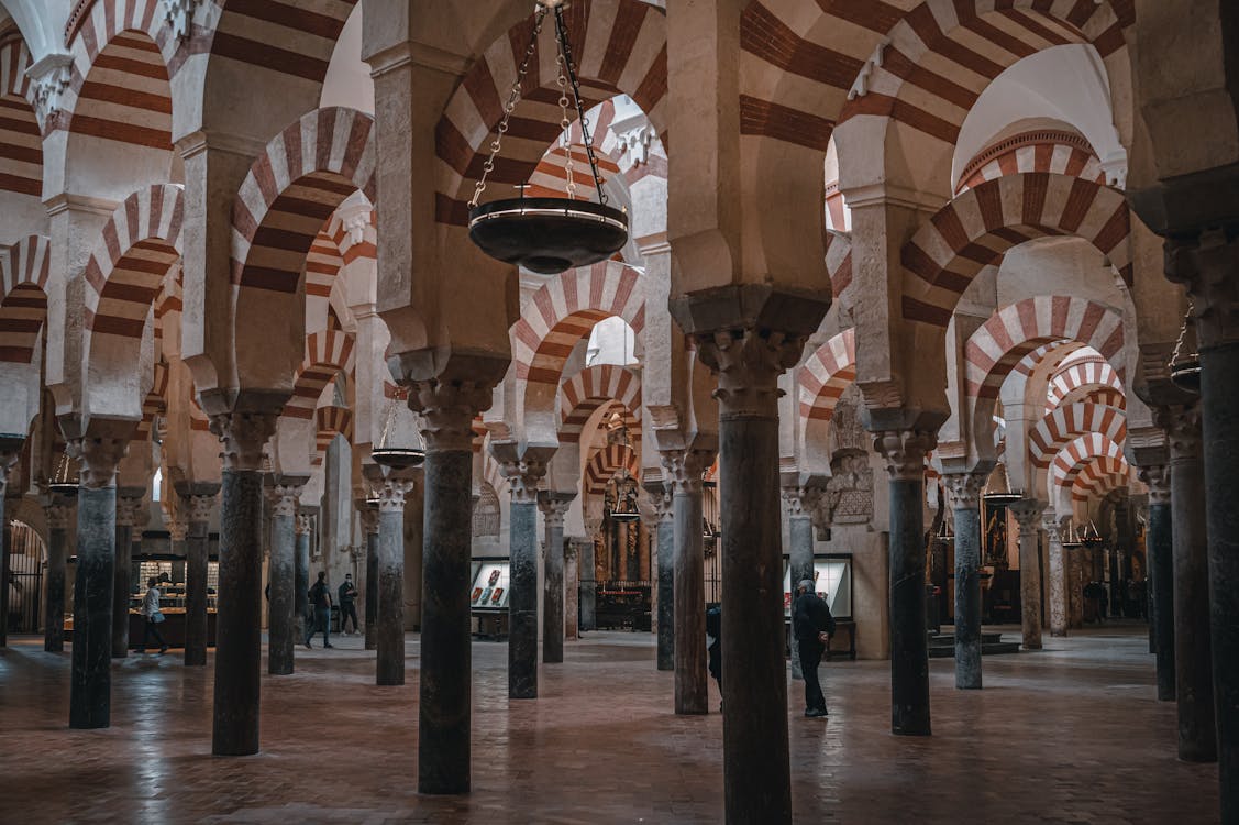Red and white striped arches inside the Mosque-Cathedral of Cordoba