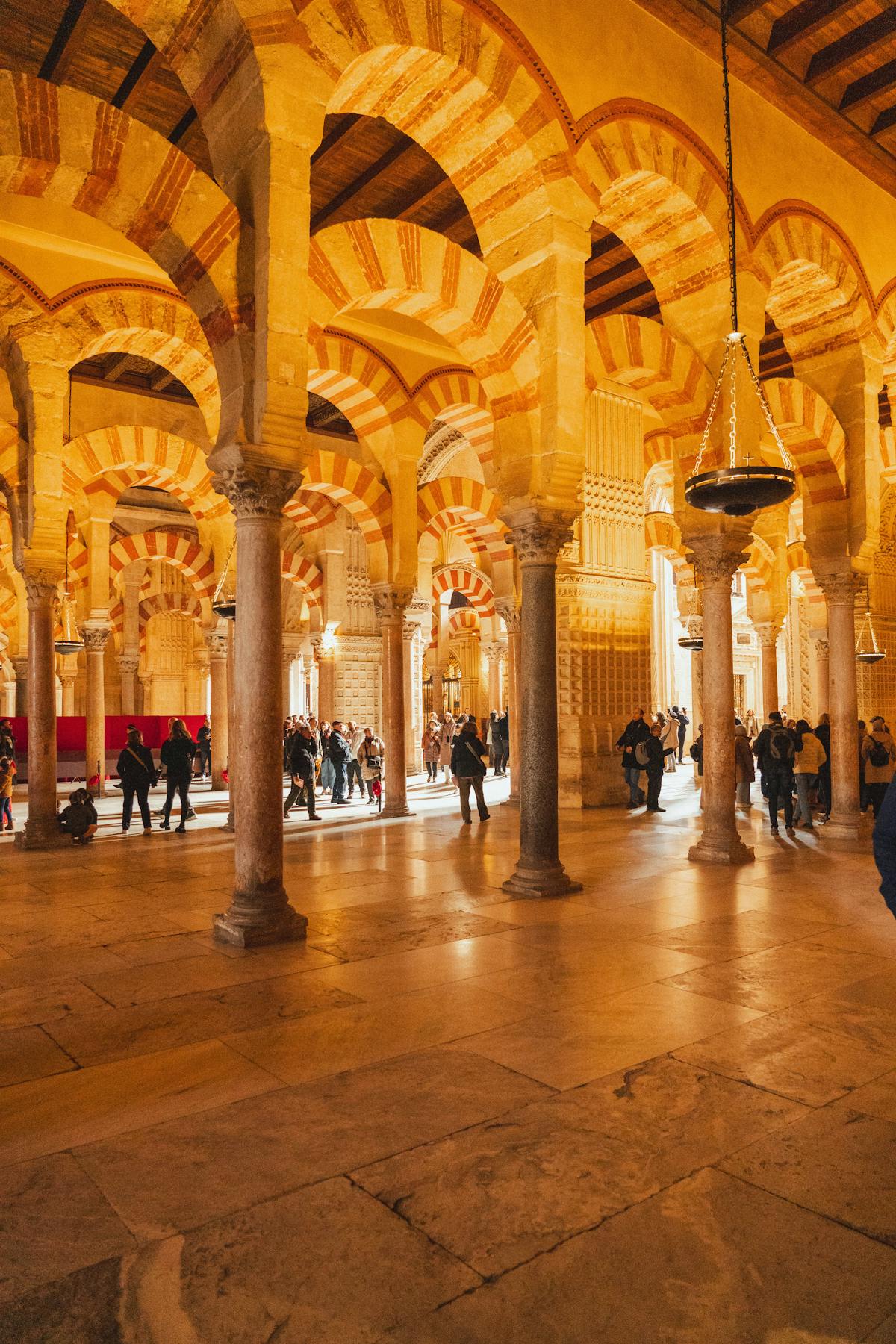 Intricate double arches and columns inside the Cordoba Mezquita
