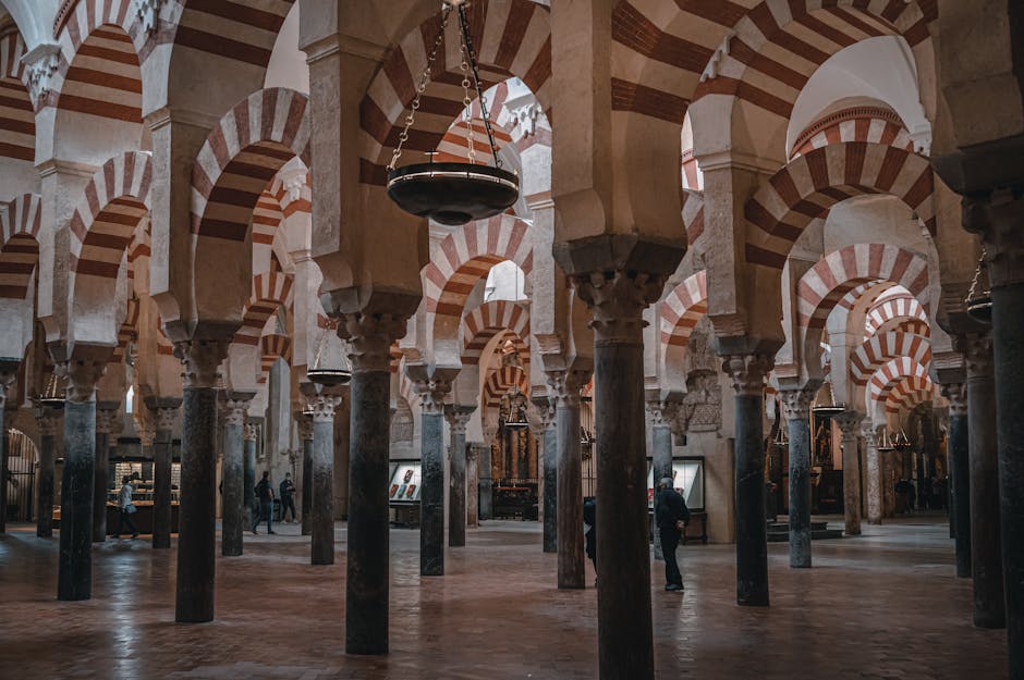 Red and white striped arches inside the Mosque-Cathedral of Cordoba