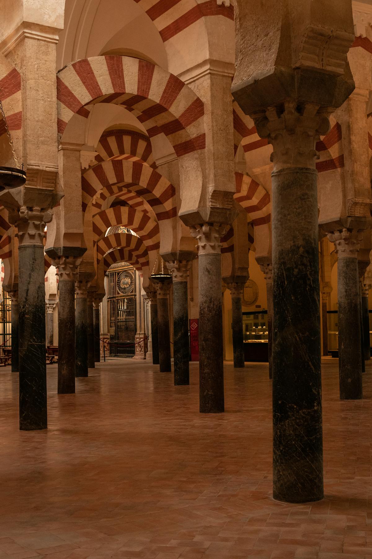 Deep perspective of pillars and arches in the Mosque-Cathedral of Cordoba