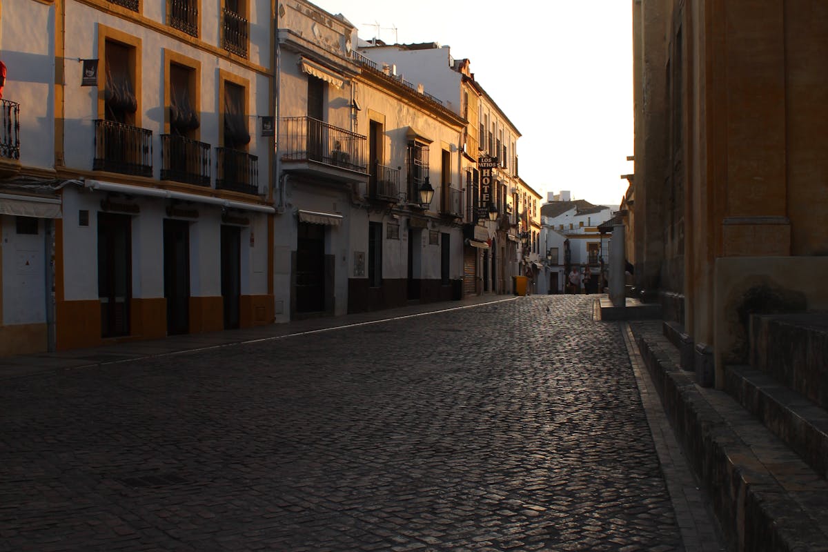 A peaceful street in Cordoba old town captured at sunset
