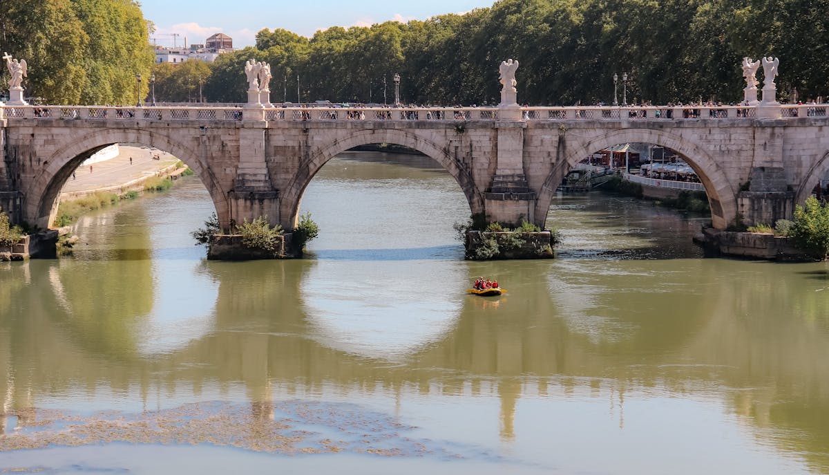 Scenic view of Ponte Sant Angelo bridge crossing the Tiber River in Rome