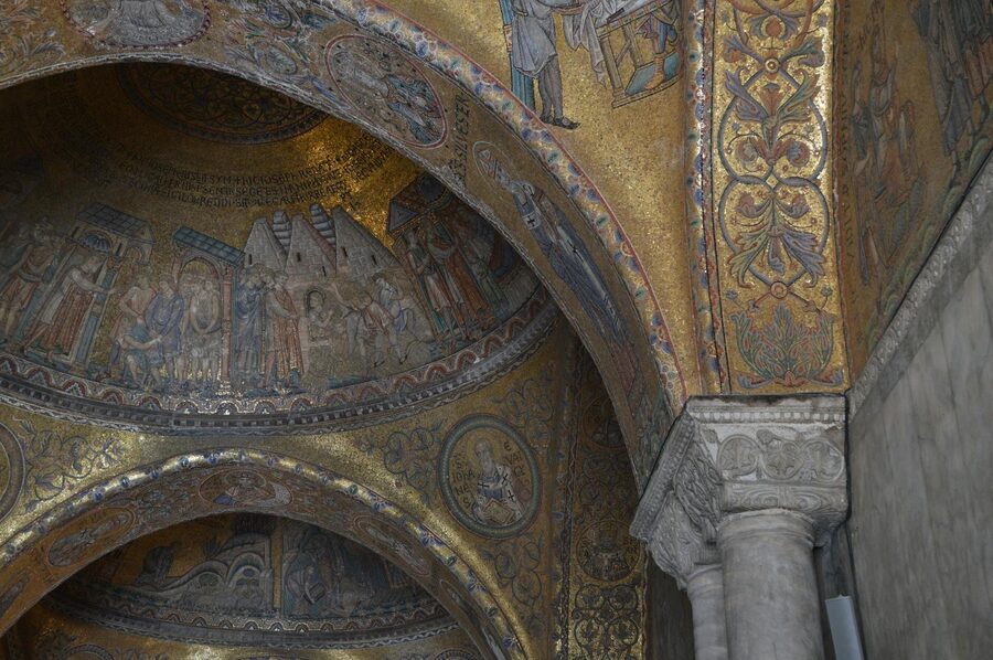 Golden Byzantine mosaic covering the ceiling of St Marks Basilica depicting religious figures