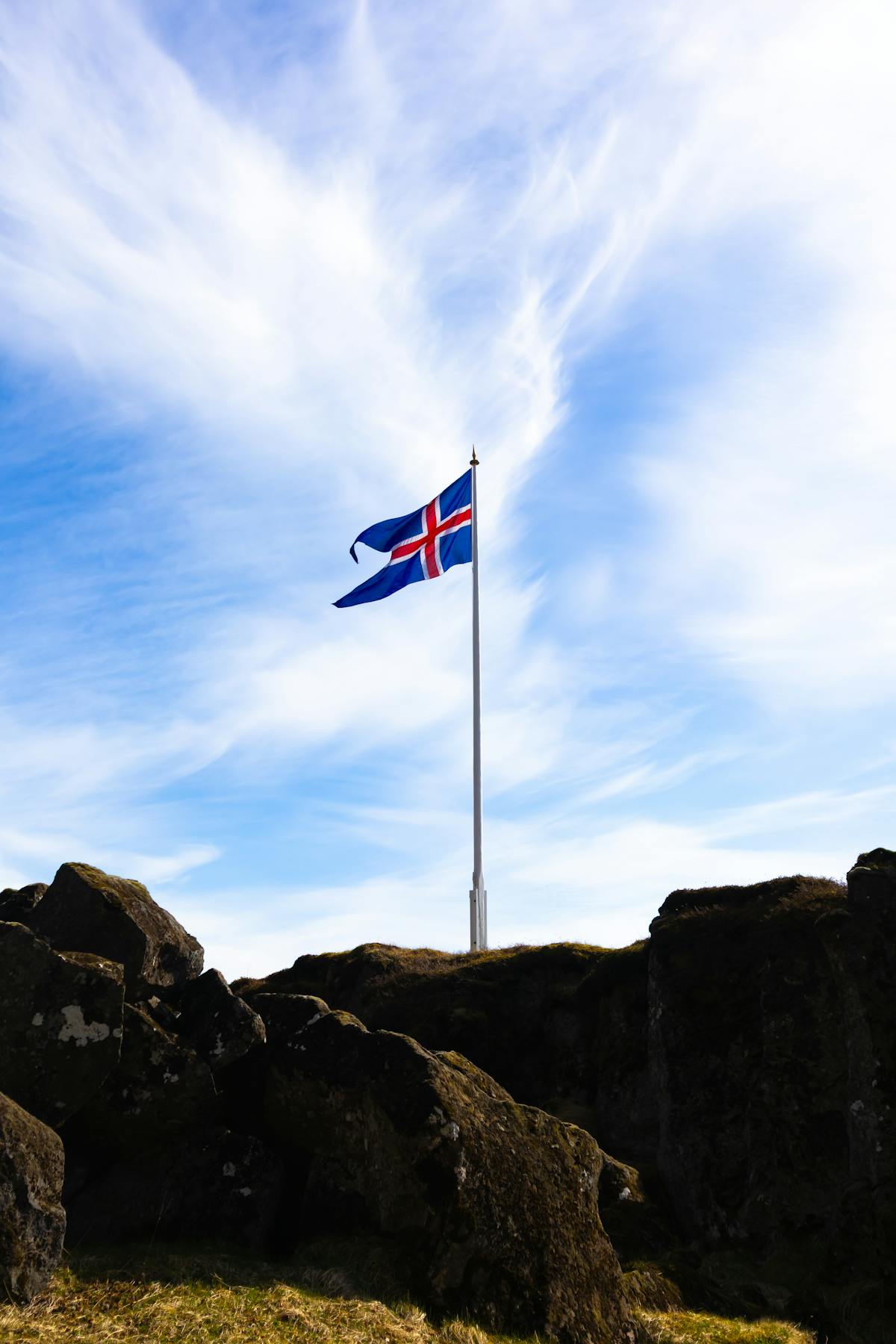 Sleeping Beauty Castle at Disneyland Paris with visitors walking along Main Street