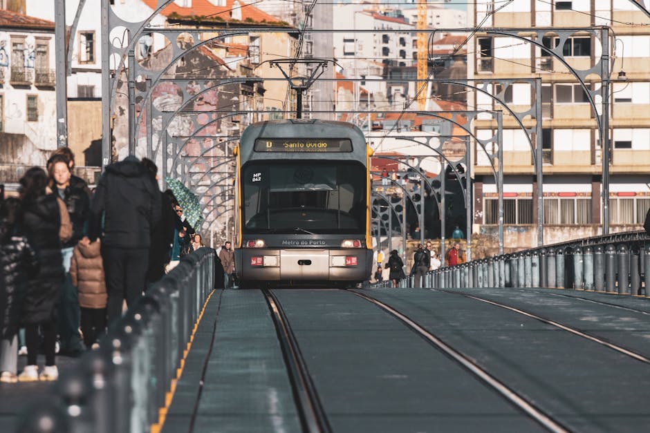 Tram crossing the Ponte Luis I bridge in Porto Portugal