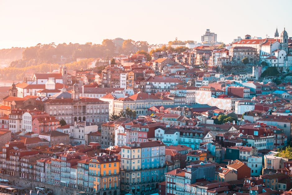 Panoramic aerial view of Porto historic cityscape at sunset