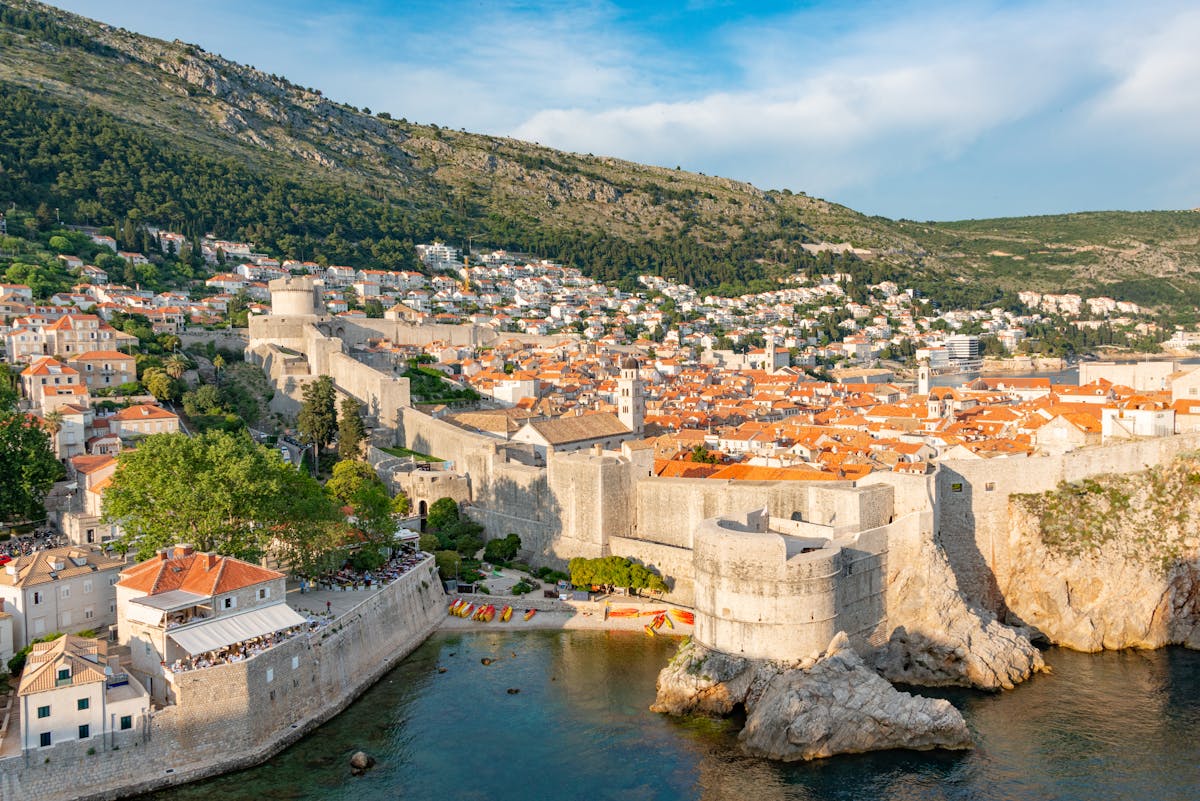 Aerial view of Dubrovnik defensive walls and Old Town along the Adriatic Sea