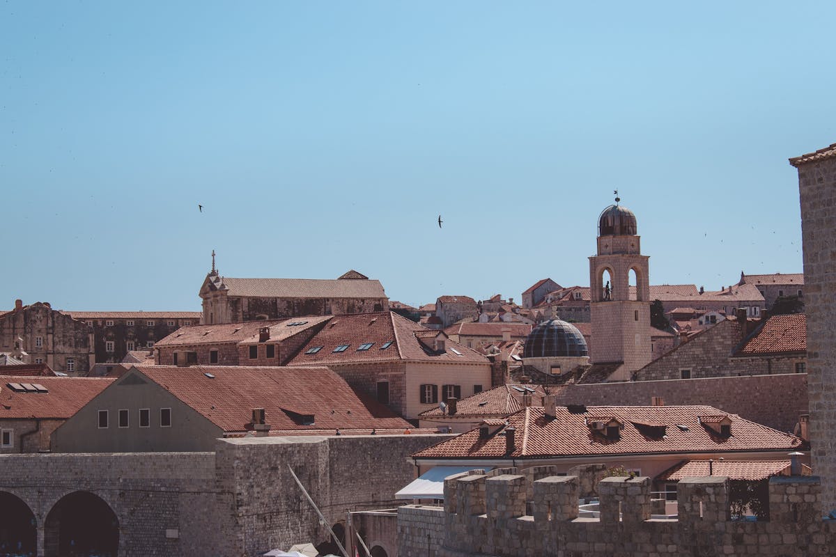 Red terracotta rooftops and medieval towers in Dubrovnik Old Town Croatia