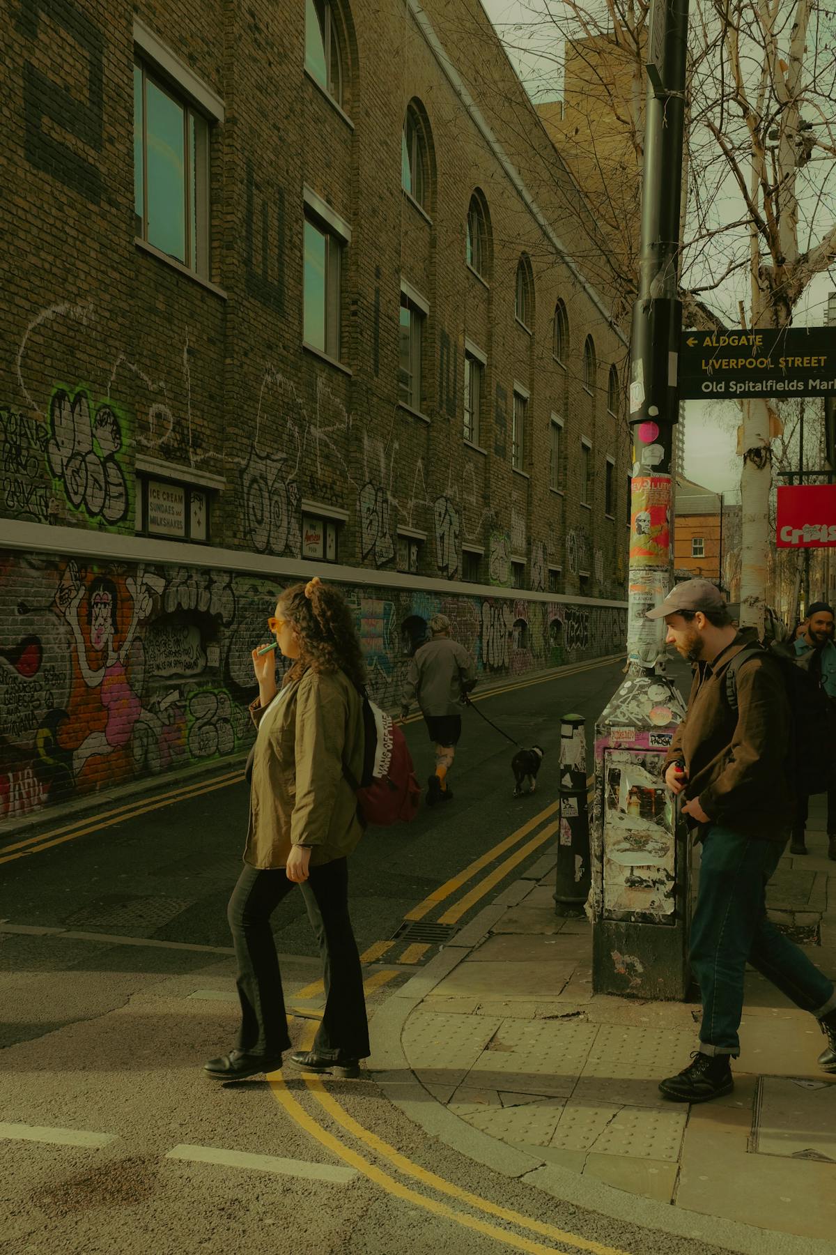 Narrow lane in London East End with old buildings