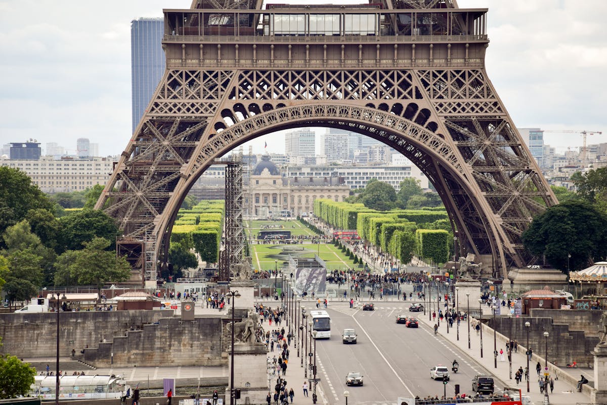 Busy Paris street scene with the Eiffel Tower in the background