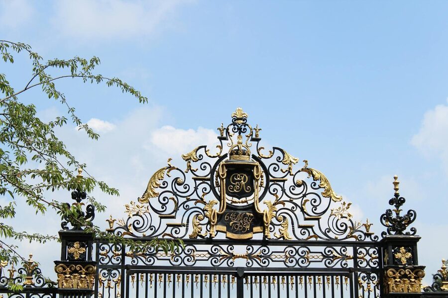 Elegant wrought iron gate with gold accents in Regents Park London