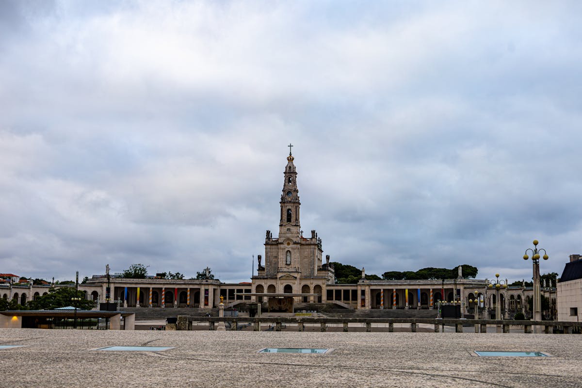The Basilica of Our Lady of the Rosary at Fátima under cloudy skies