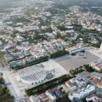 Aerial view of the Sanctuary of F\u00e1tima showing the grand esplanade and basilicas