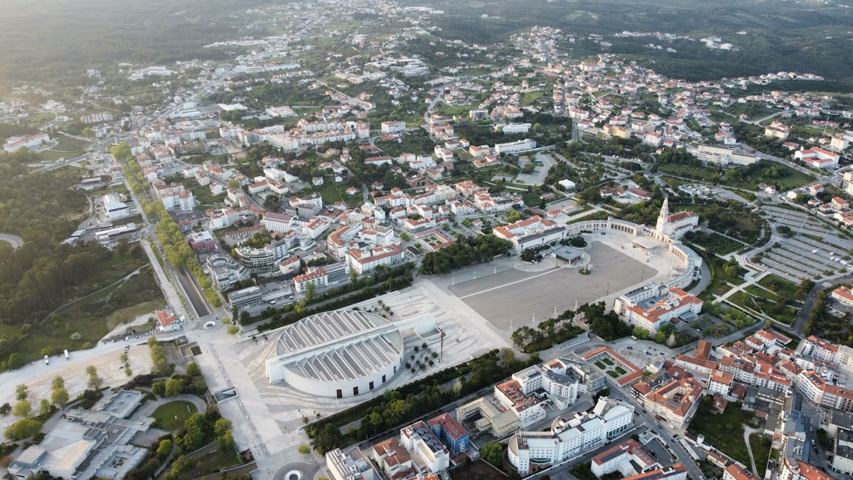 Aerial view of the Sanctuary of F\u00e1tima showing the grand esplanade and basilicas