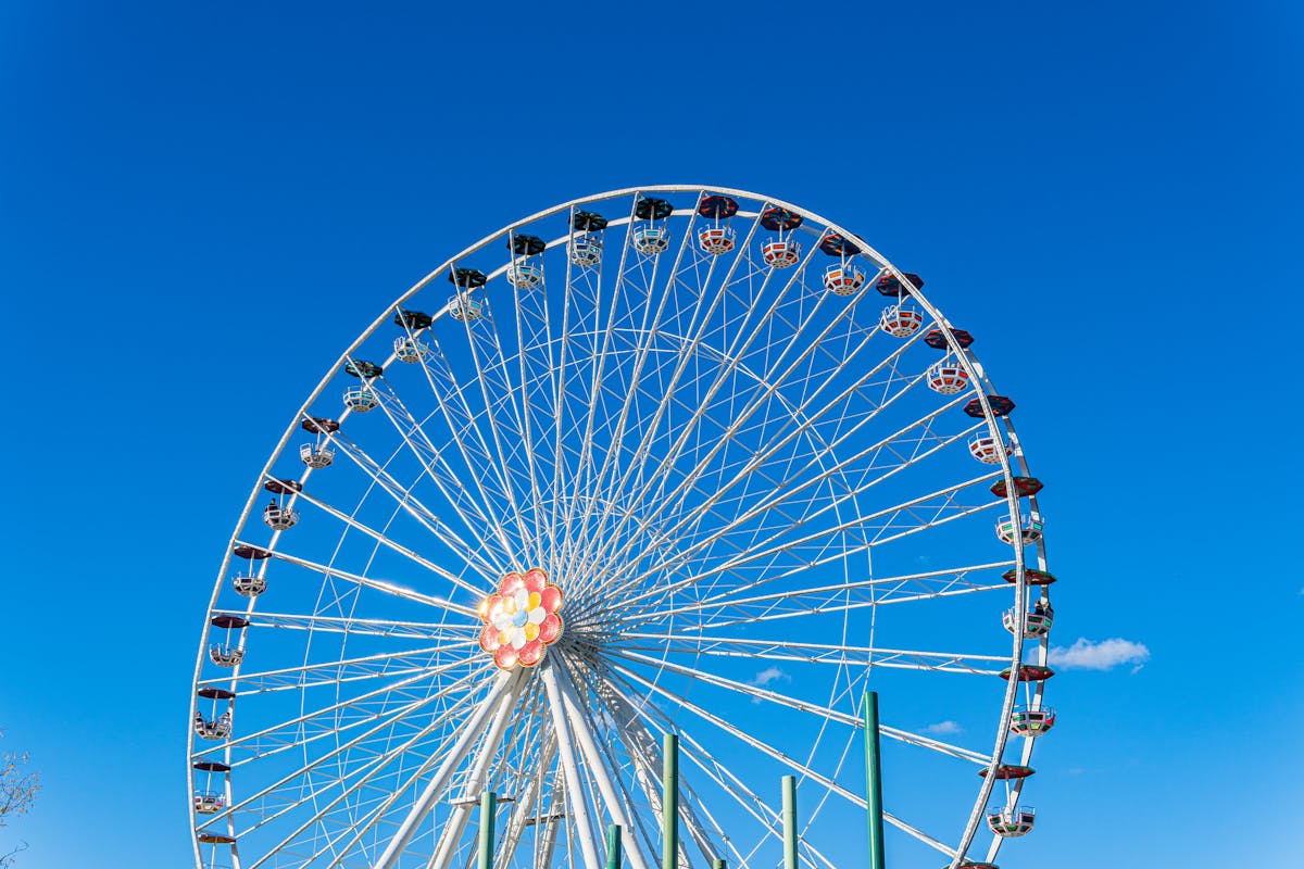 Ferris wheel against blue sky