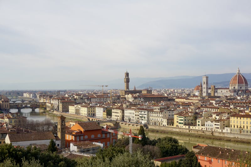 Elevated view of Florence with Ponte Vecchio and Santa Maria del Fiore Cathedral