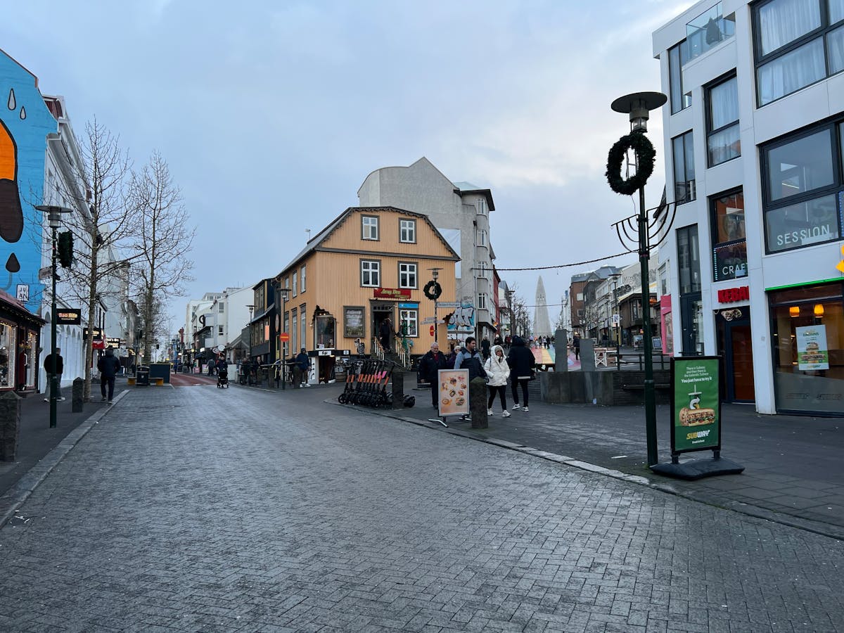 People walking on Laugavegur shopping street in Reykjavik Iceland