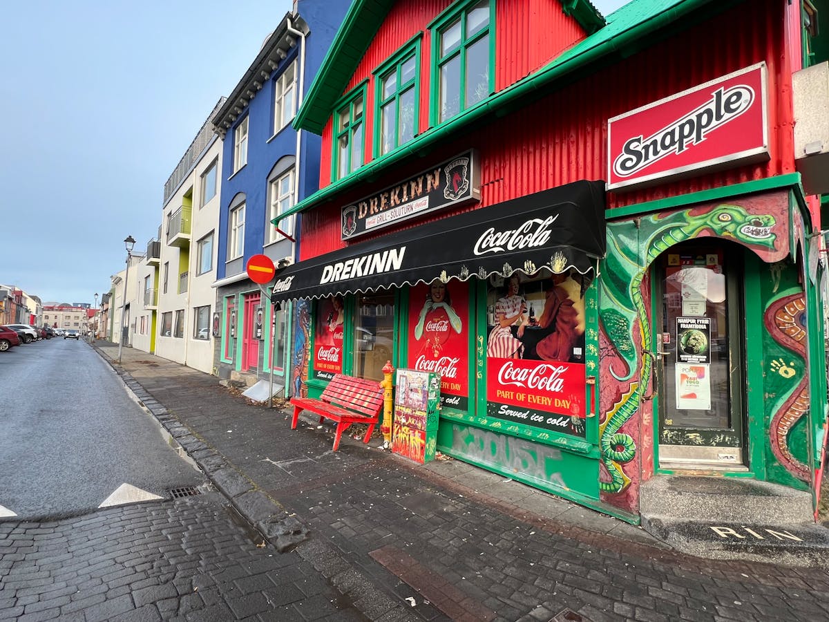 Colorful storefronts and shops on a street in Reykjavik Iceland