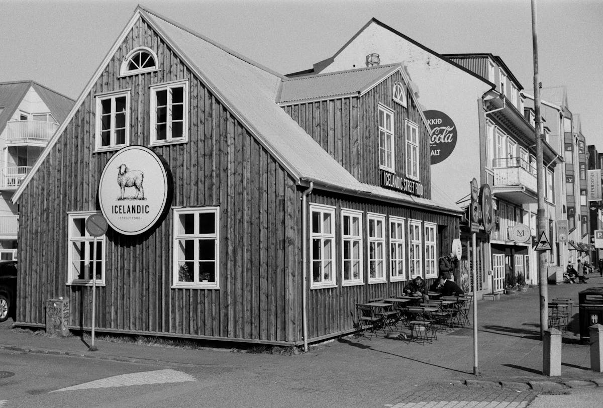 Traditional wooden restaurant building on a Reykjavik street