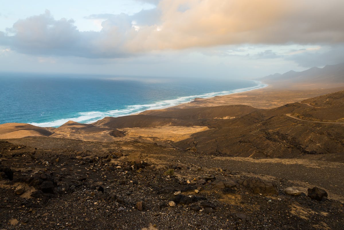 Aerial shot of Fuerteventura rugged coastline with dramatic cliffs and ocean