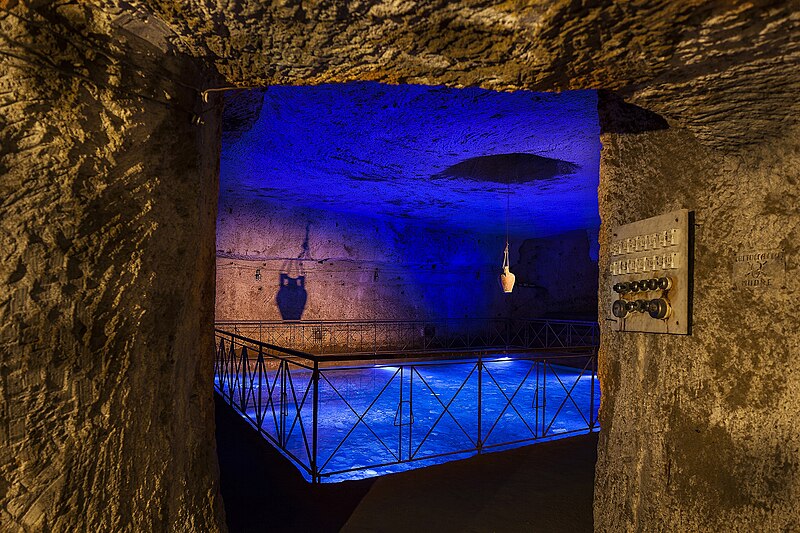 Underground cistern with wartime artifacts in Galleria Borbonica Naples