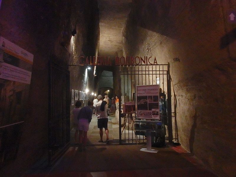 Interior of Galleria Borbonica showing stone arched tunnel in Naples