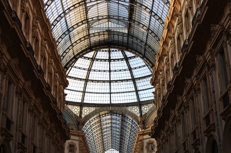 Elegant arched glass ceiling of Galleria Vittorio Emanuele II