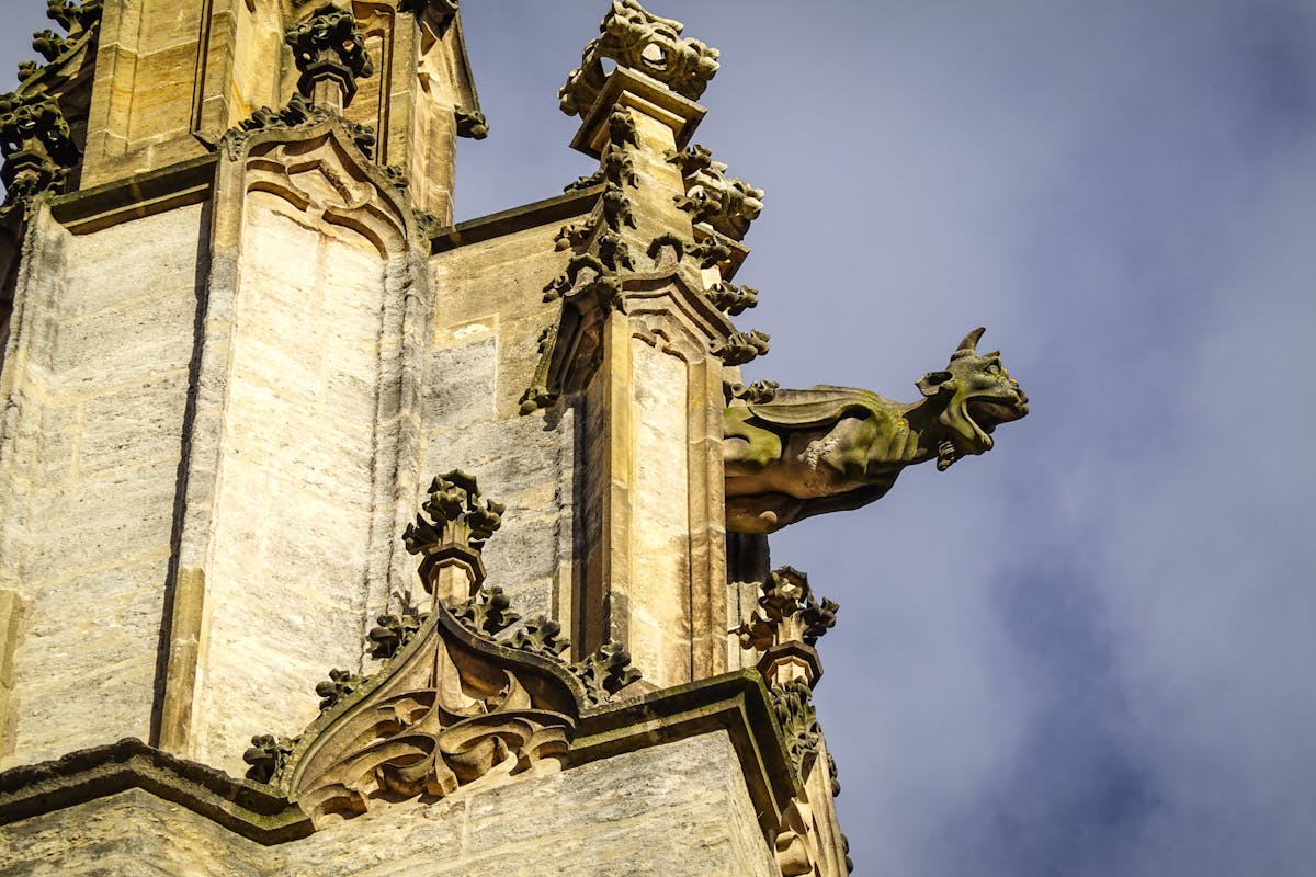 Close-up of a gothic gargoyle on St. Barbara Church facade in Kutna Hora