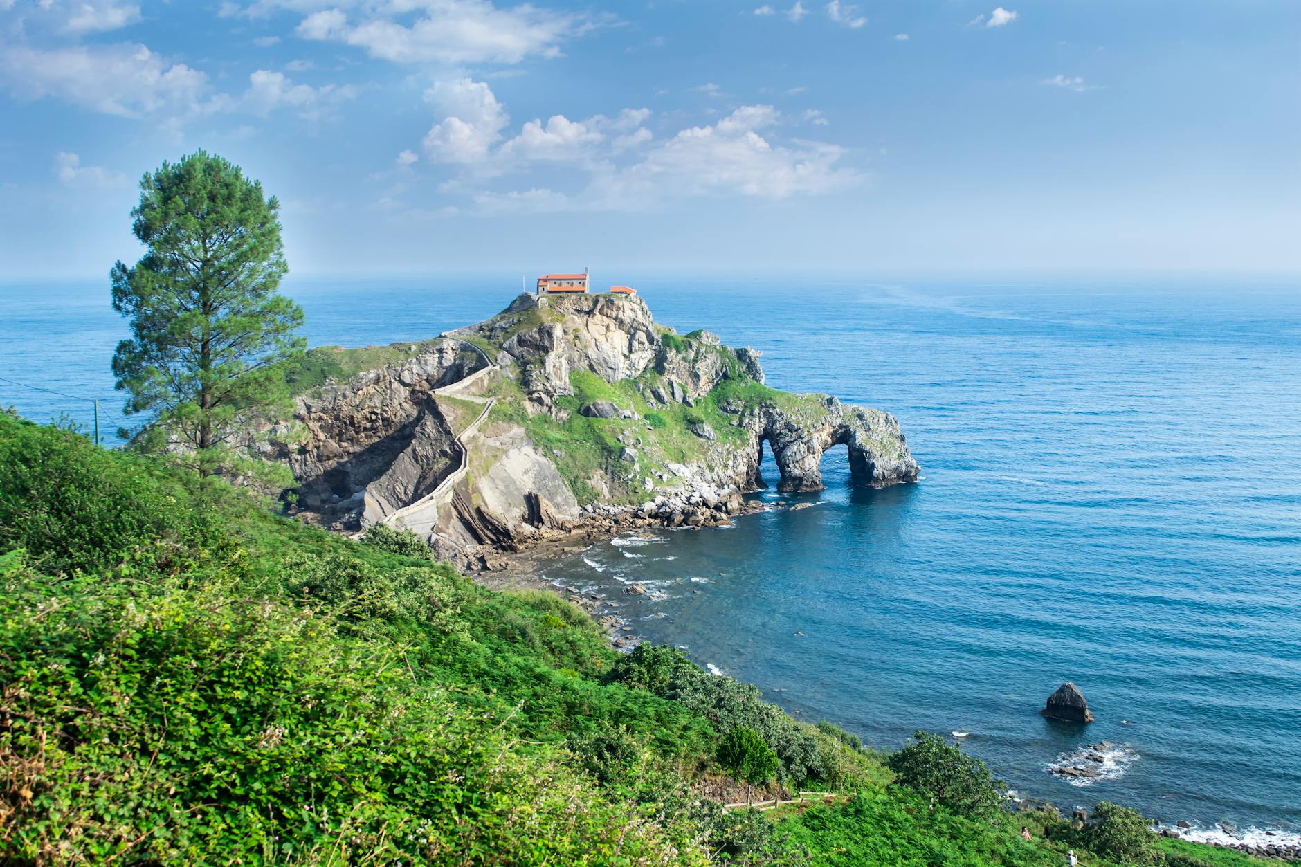 The hermitage of San Juan de Gaztelugatxe on a rocky islet in the Bay of Biscay
