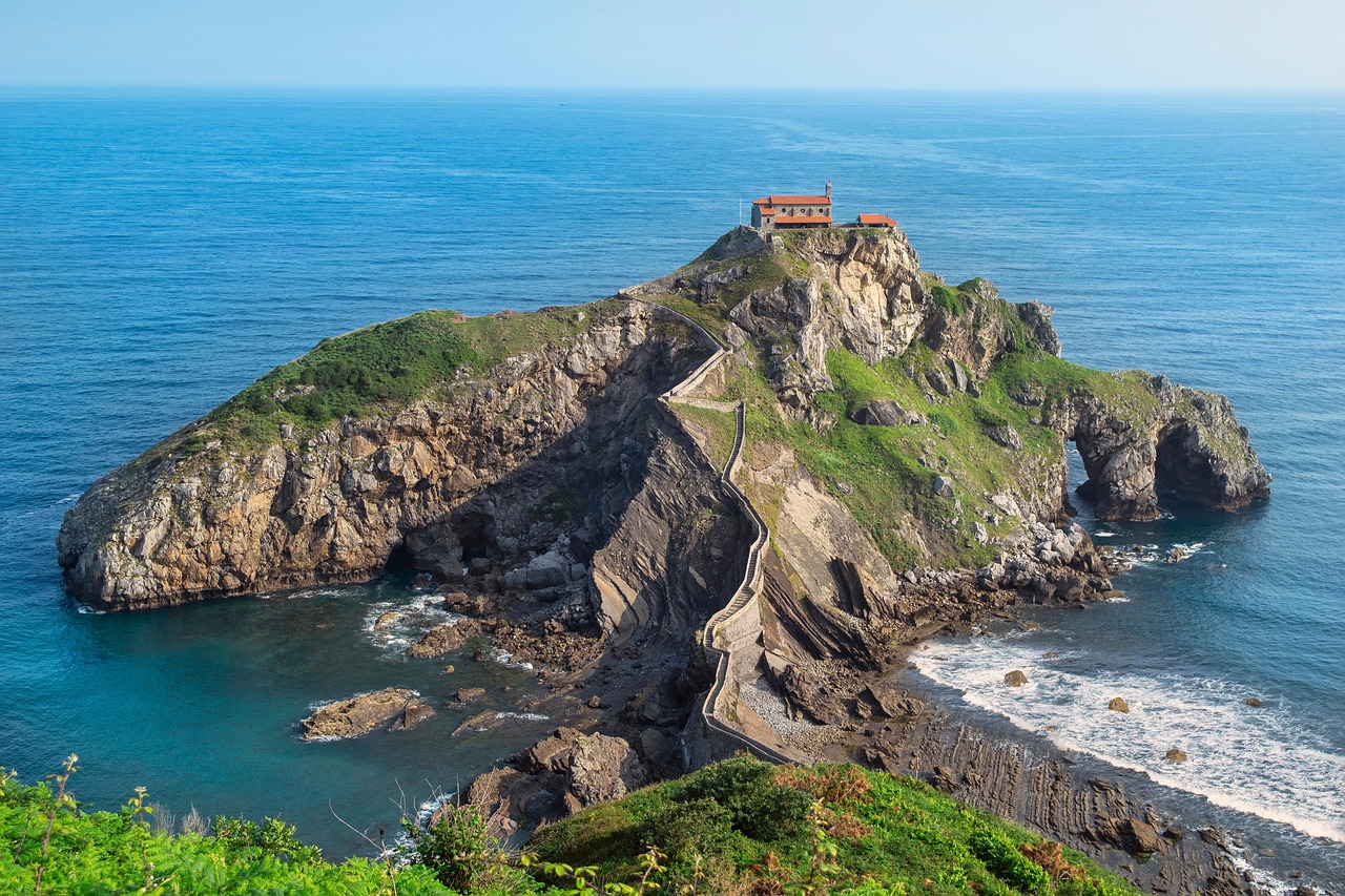 Stone steps and path leading up to the hermitage on Gaztelugatxe island in Basque Country