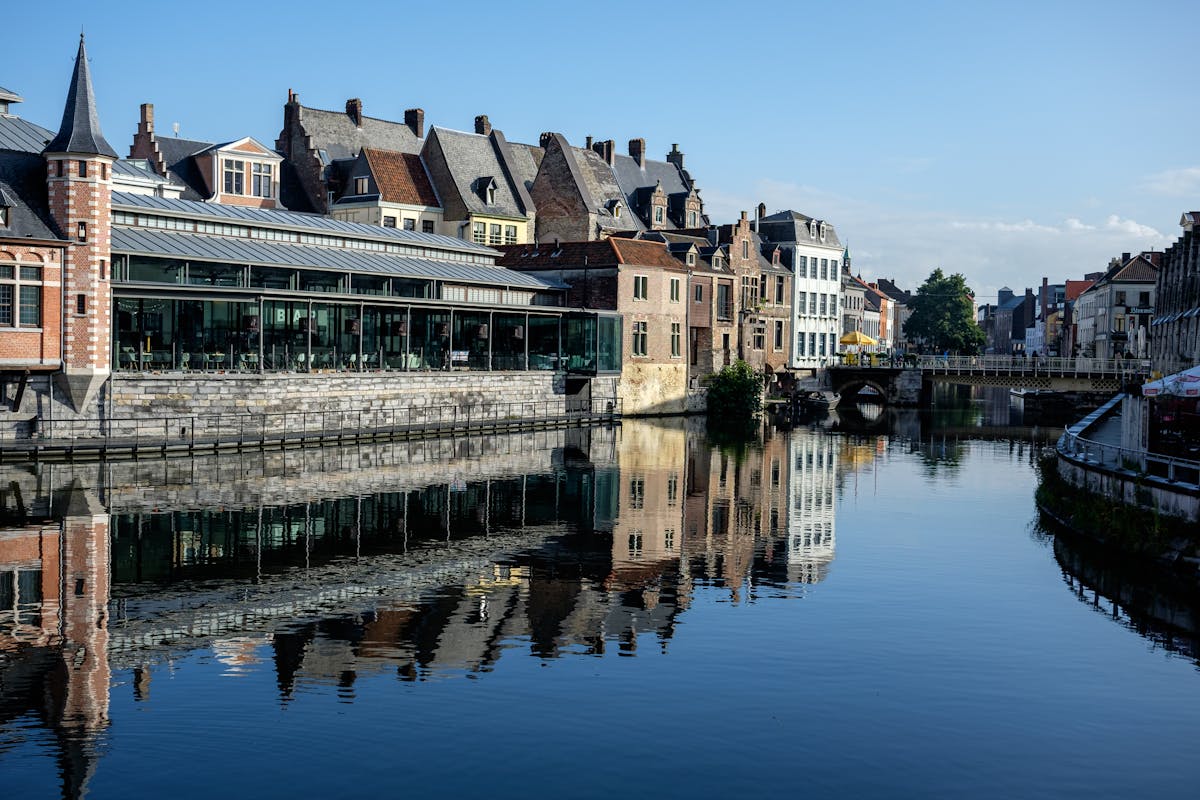 Canals lined with historic buildings in Ghent Belgium
