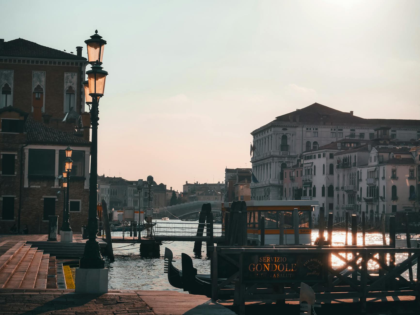 Gondolas at the Grand Canal in Venice during sunset