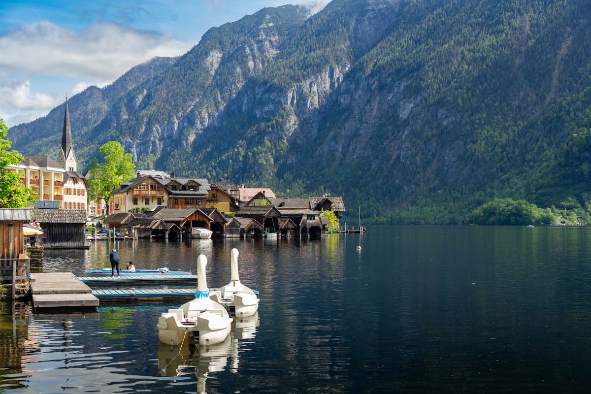 Scenic view of Hallstatt town by the lake with mountains in Upper Austria