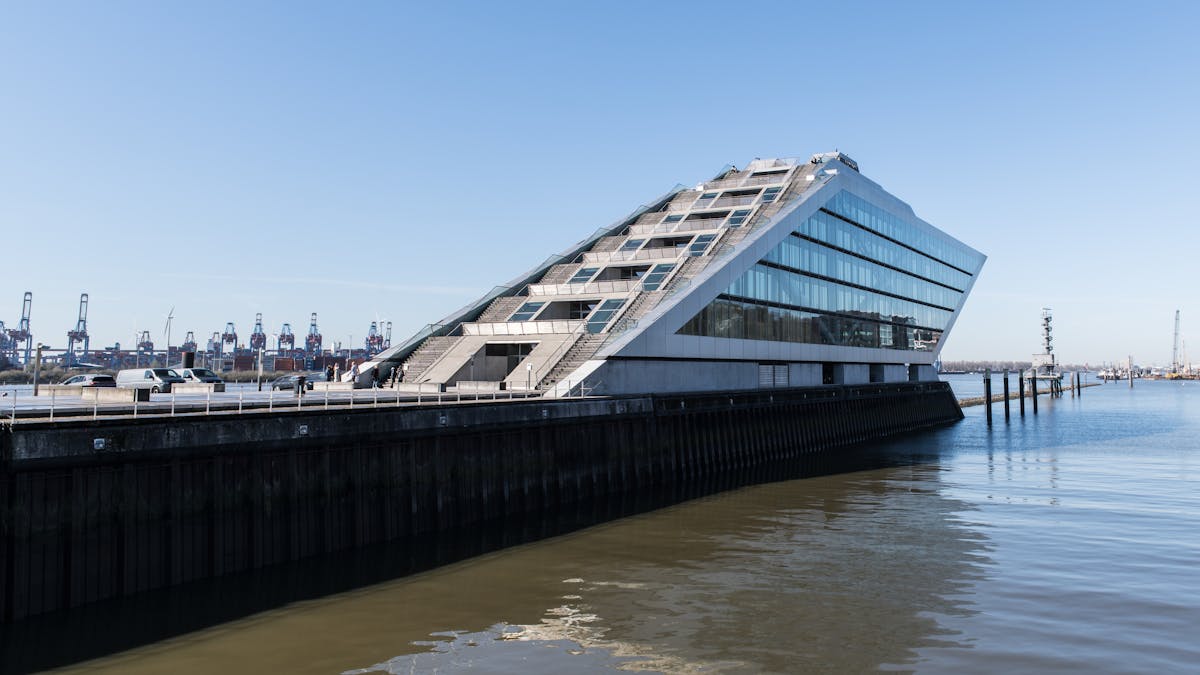 Modern Dockland building in Hamburg harbor with stunning views under cloudy skies