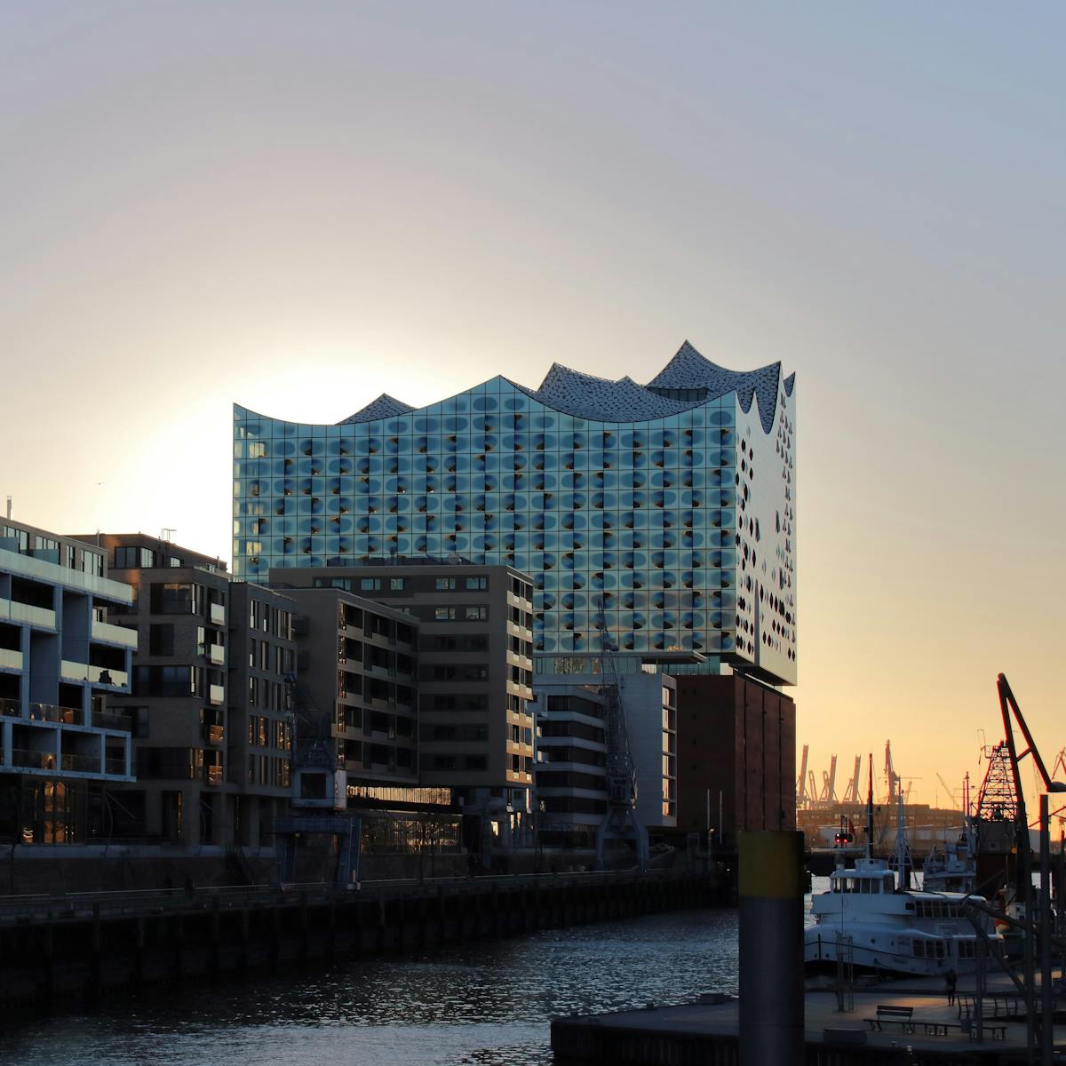 The Elbphilharmonie concert hall in Hamburg at sunset seen from the Elbe River