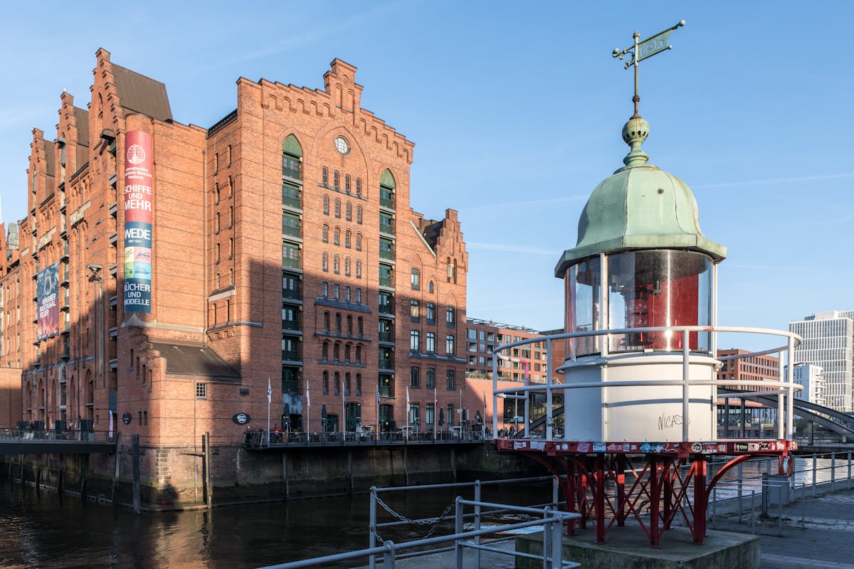 Historic Speicherstadt warehouse district in Hamburg featuring iconic red brick architecture and canal