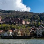 Picturesque view of Heidelberg Castle and old town across the Neckar River in Germany.