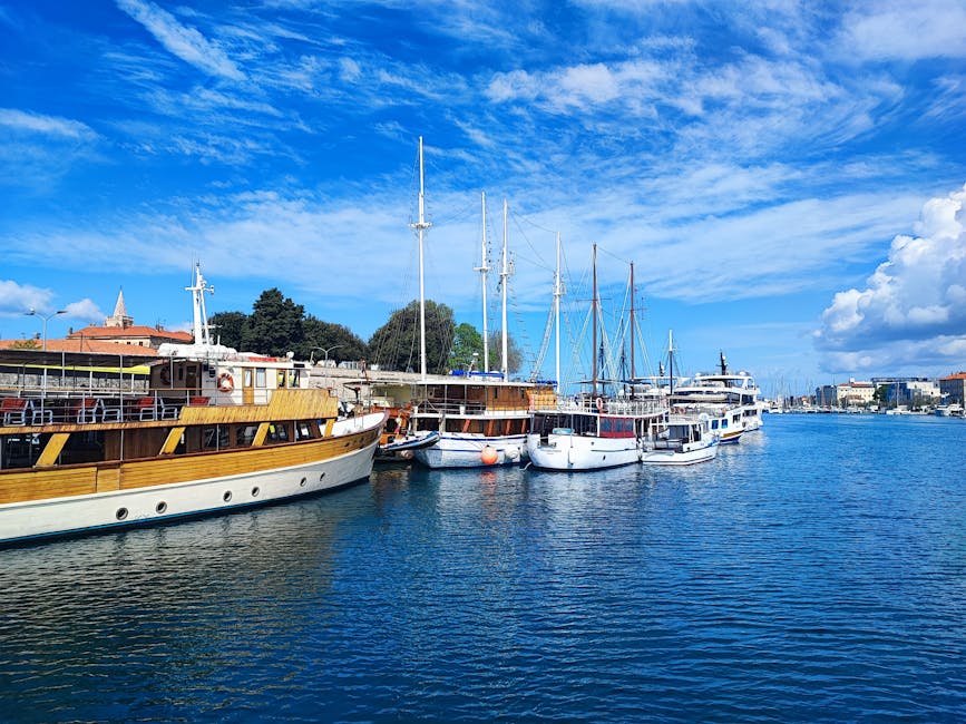 Sailboats docked in the tranquil harbor of the Dalmatian coast