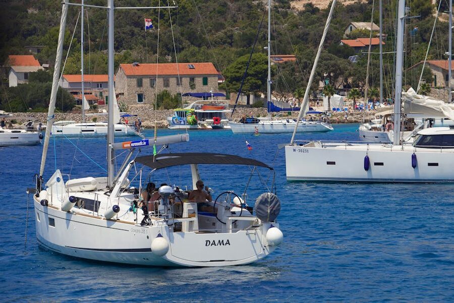 Sailing yachts anchored in a calm Mediterranean bay