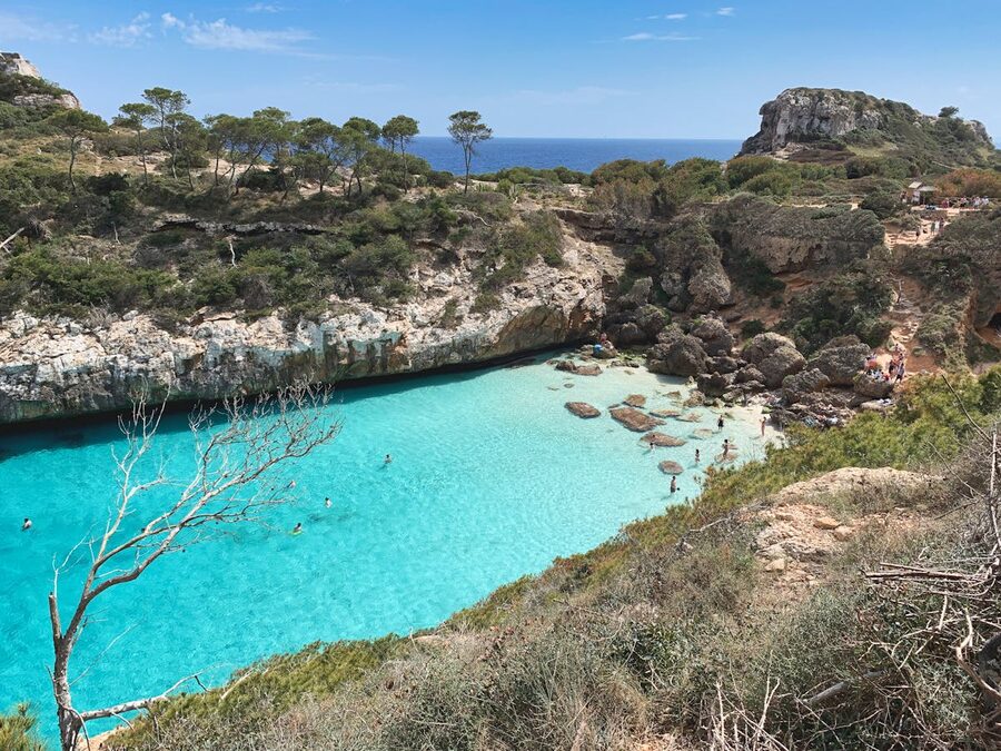 Rocky coastline of Sant Antoni de Portmany Ibiza with azure water