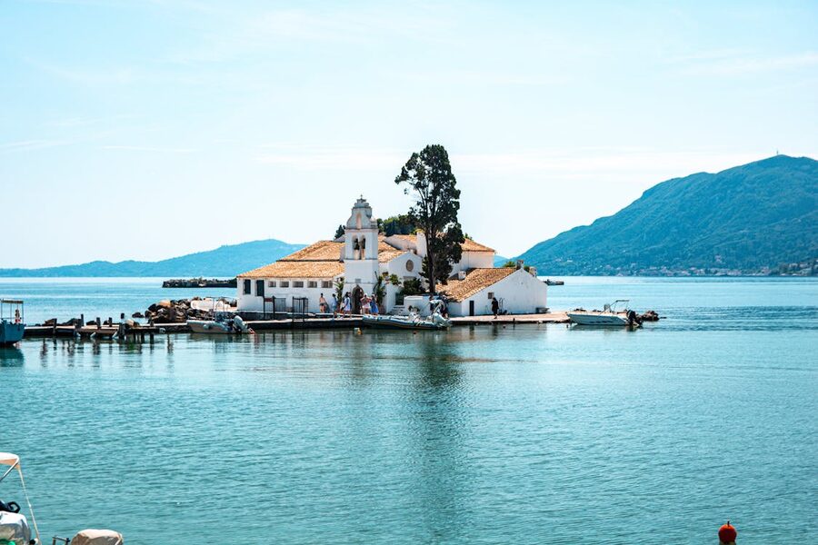 Idyllic view of Vlacherna Monastery on a sunny summer day in Corfu, Greece.