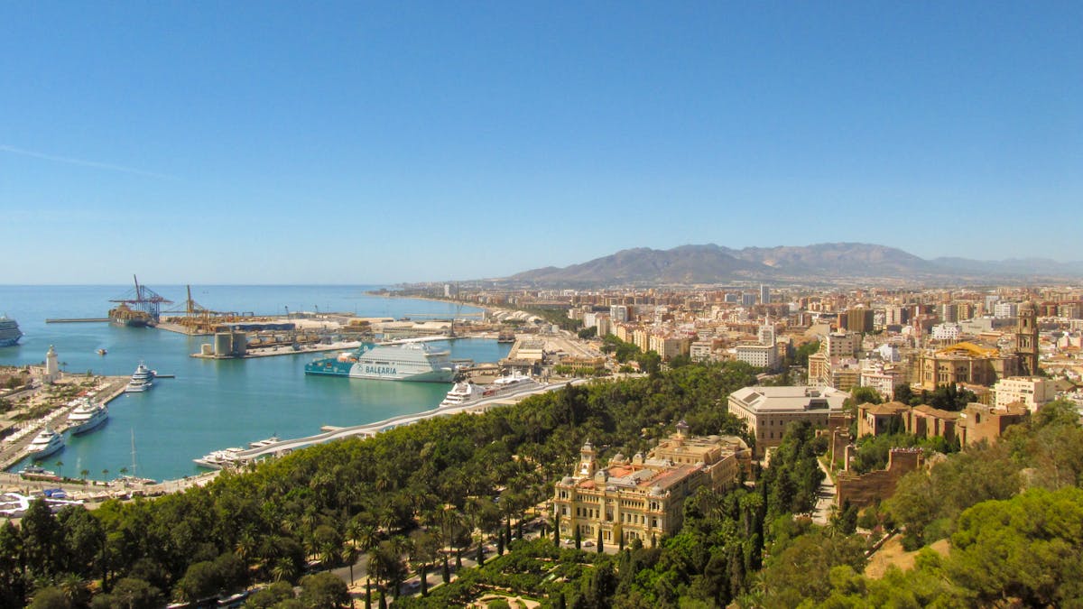 Aerial view of Malaga old town with cathedral and Mediterranean in background