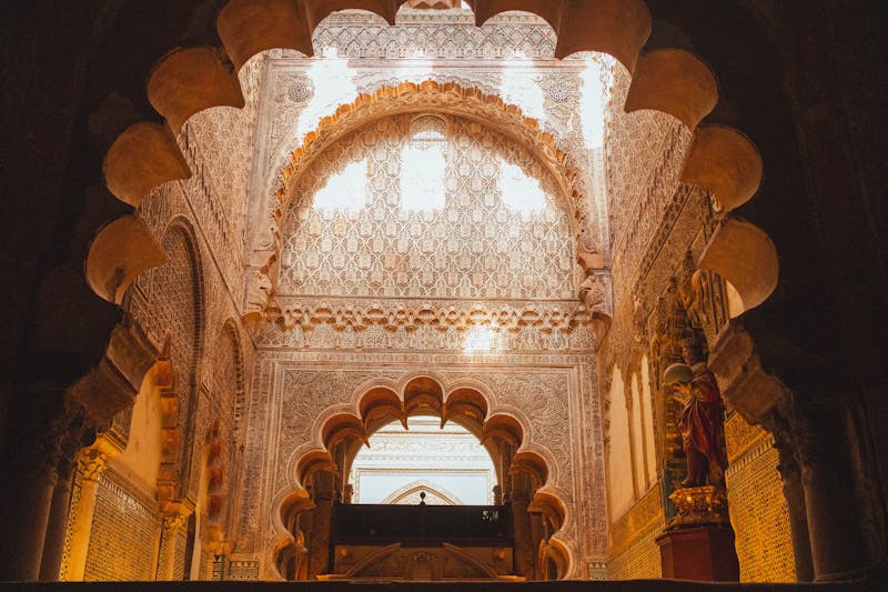 Intricate Moorish patterns and arches inside the Mosque-Cathedral of Cordoba