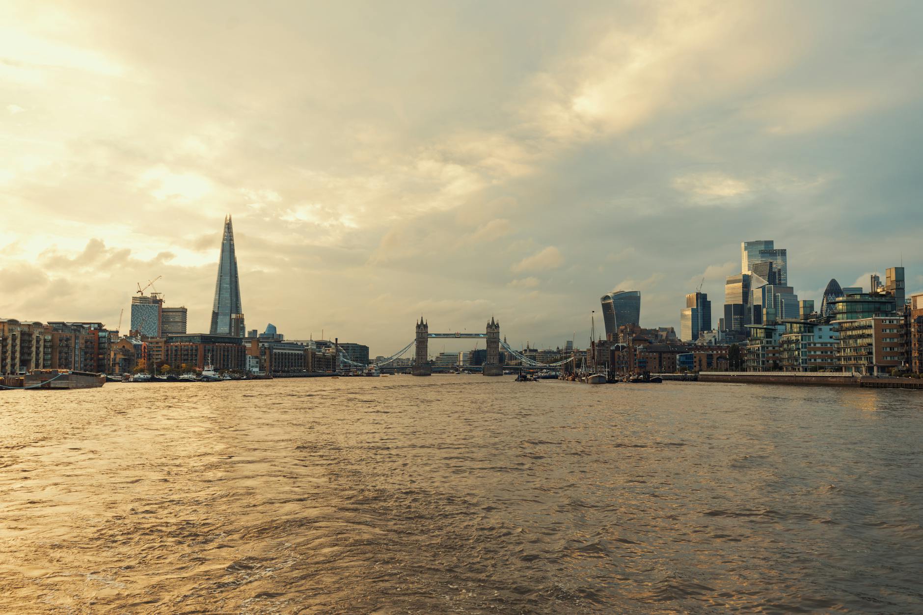 Panoramic view of London with the Shard tower and Tower Bridge visible over the river