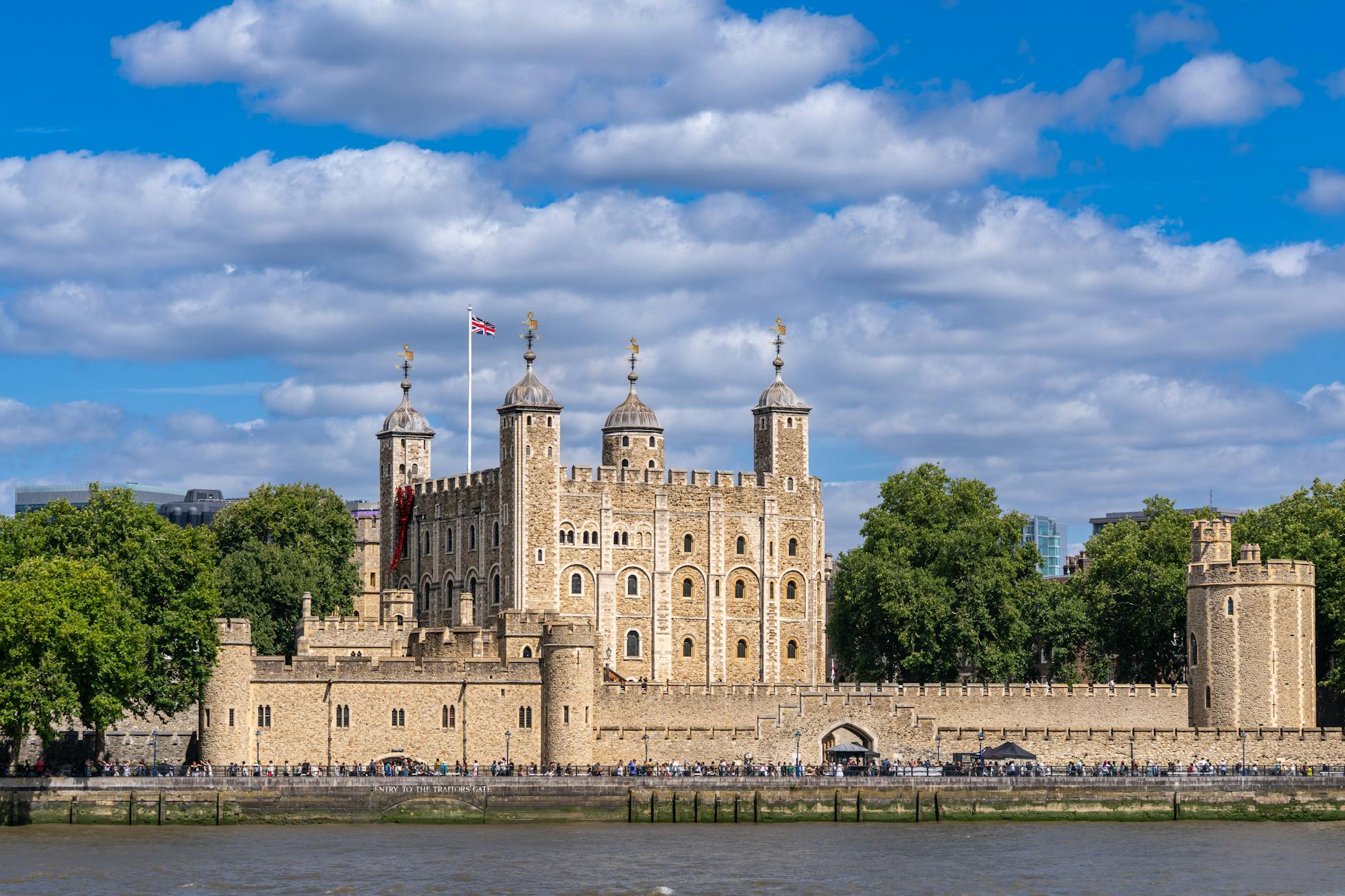 The Tower of London medieval fortress seen from across the river on a clear day
