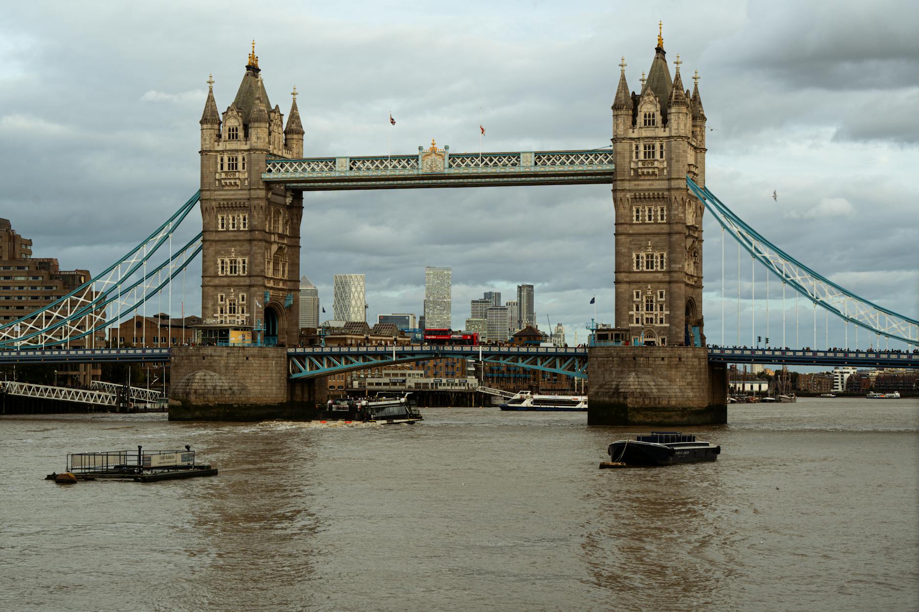 View of Tower Bridge from river level along the Thames walking path