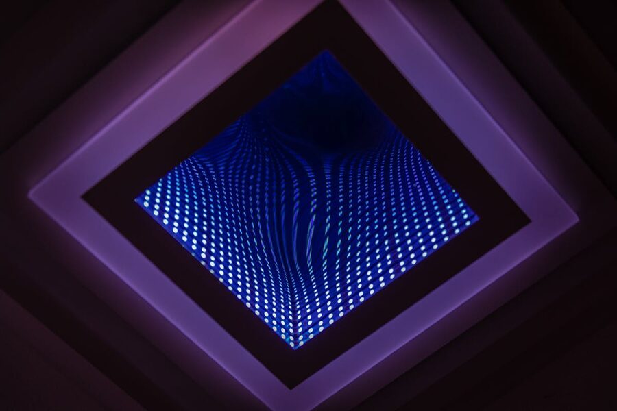 Captivating abstract view of LED infinity mirror with colorful light patterns
