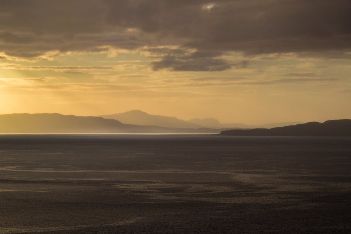 Sunset view over the waters at Kyleakin, Isle of Skye with dramatic clouds